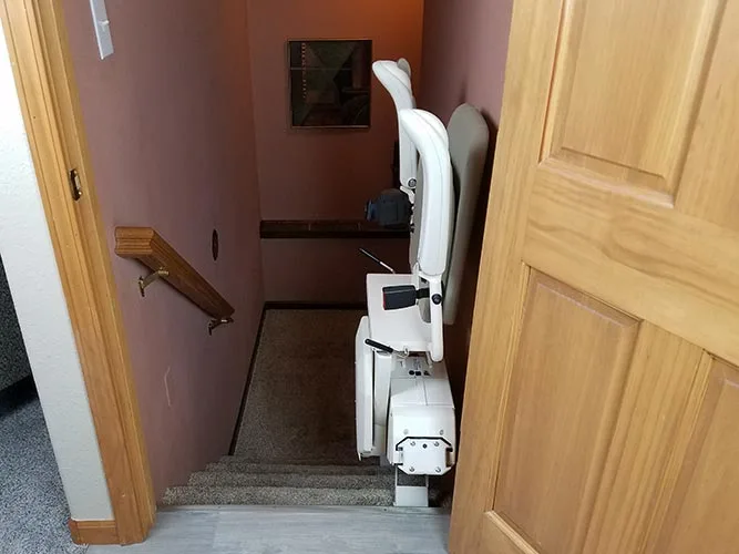 Installing a Stair Lift With a Top-of-Stairs Door (2026)